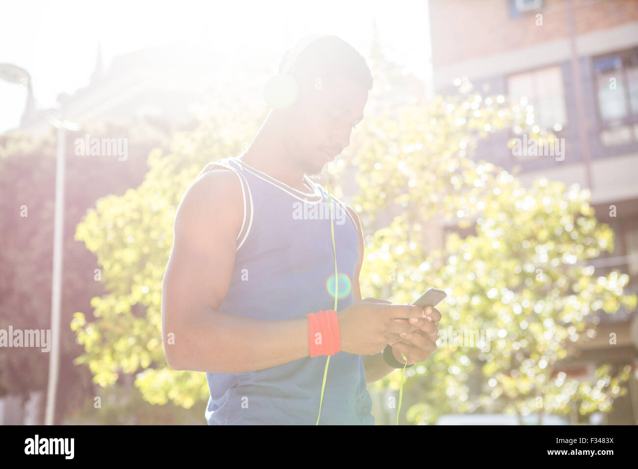 Athlete man using mobile hi-res stock photography and images - Alamy