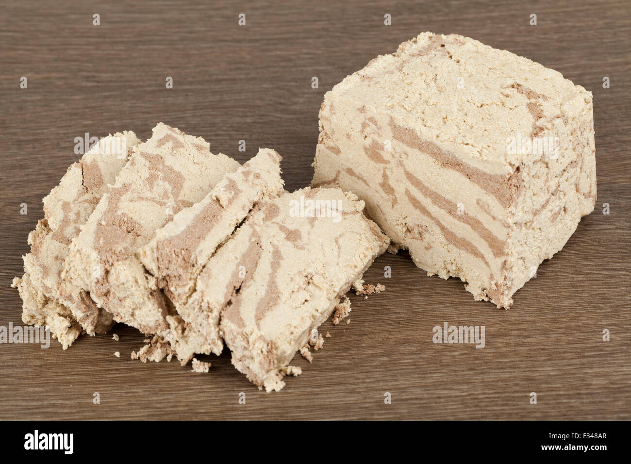 halva, oriental sweet dessert on wooden table Stock Photo - Alamy