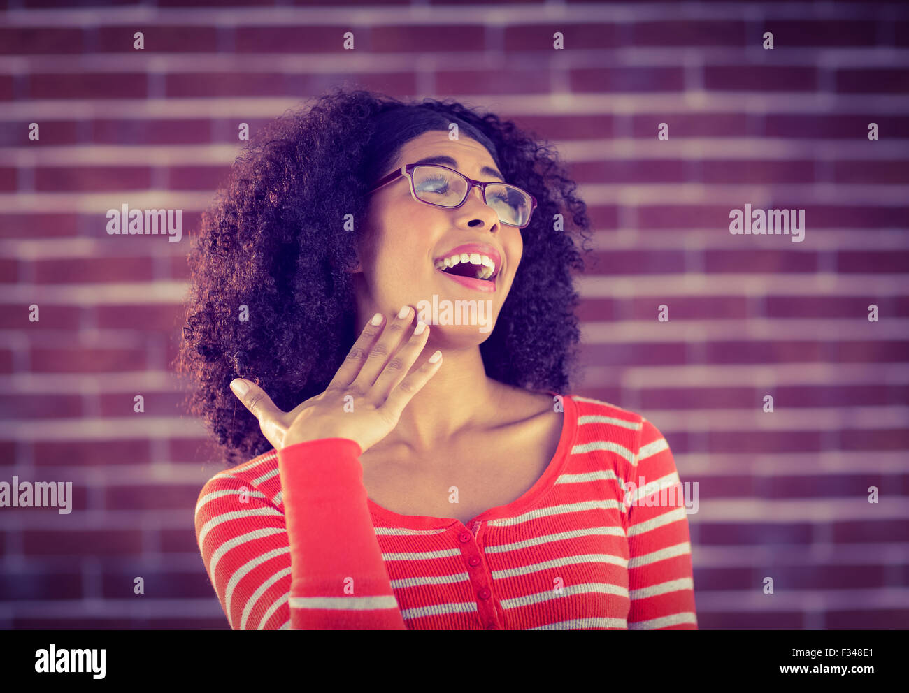 Surprised attractive young woman Stock Photo - Alamy