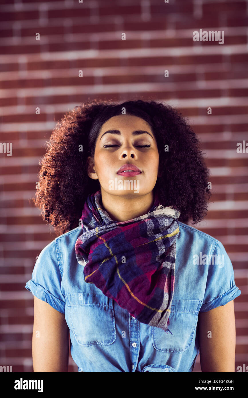 Attractive young woman with eyes closed Stock Photo - Alamy