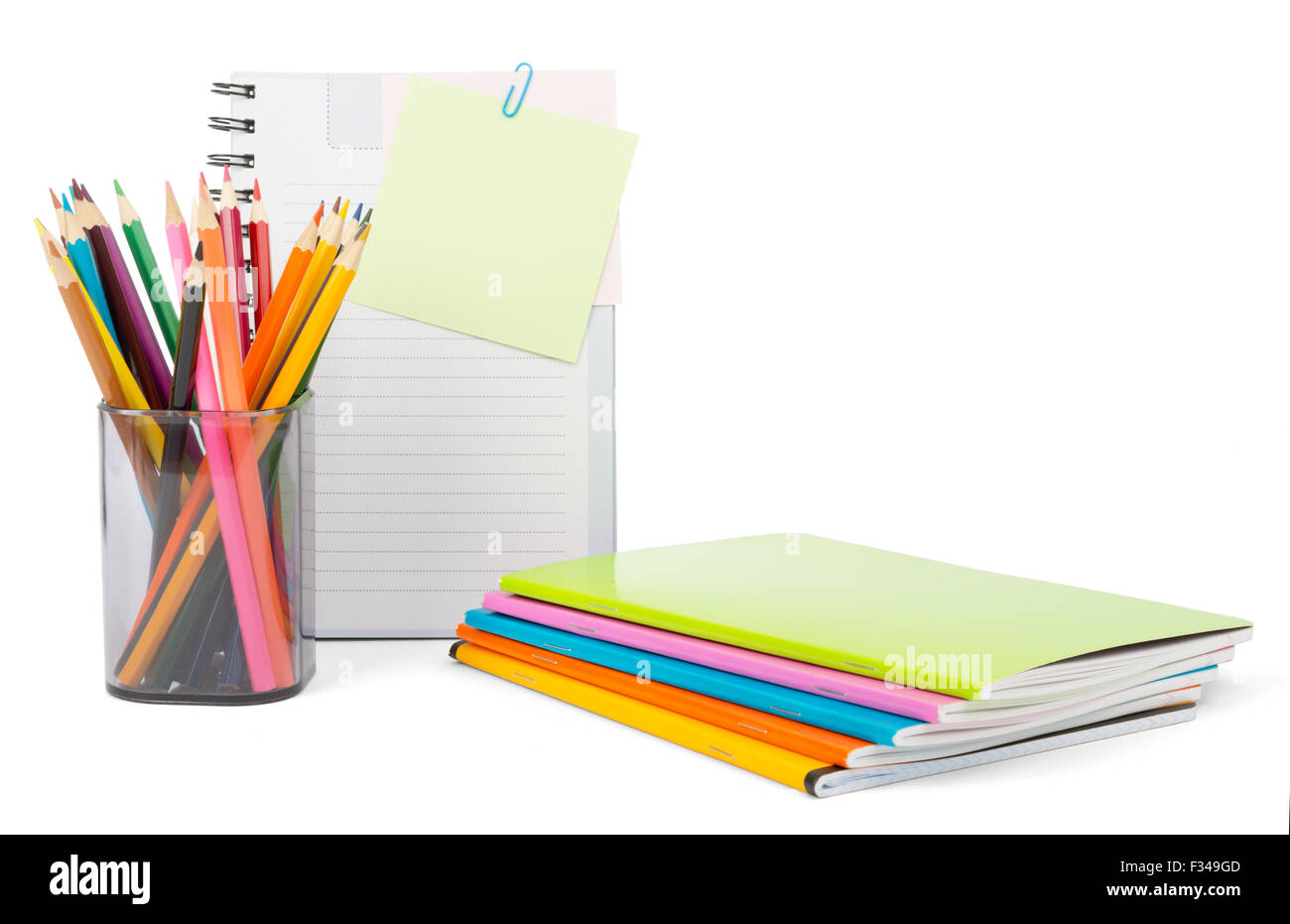 Crayons with notebooks Stock Photo - Alamy