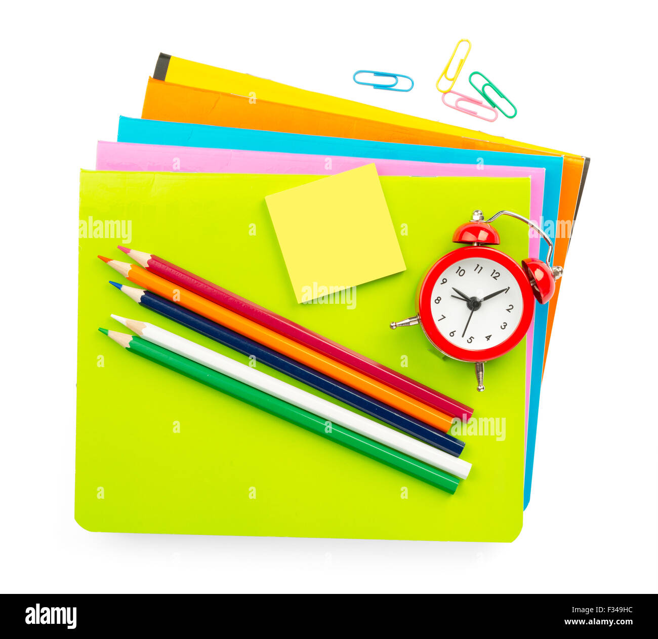 Crayons and notebook Stock Photo - Alamy