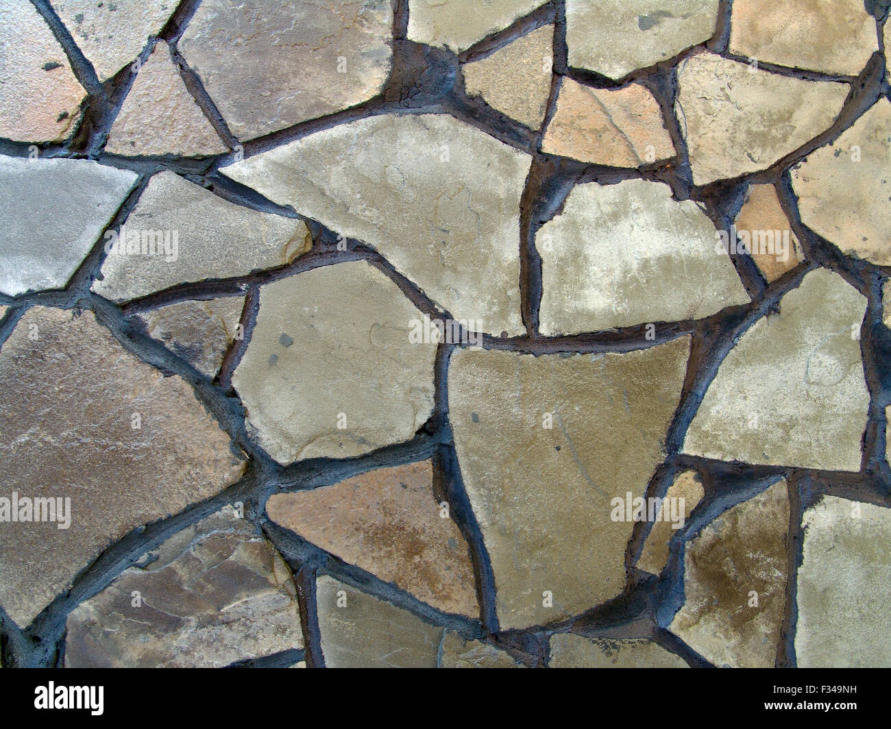 The sharp stone background, design of wall or fence Stock Photo - Alamy
