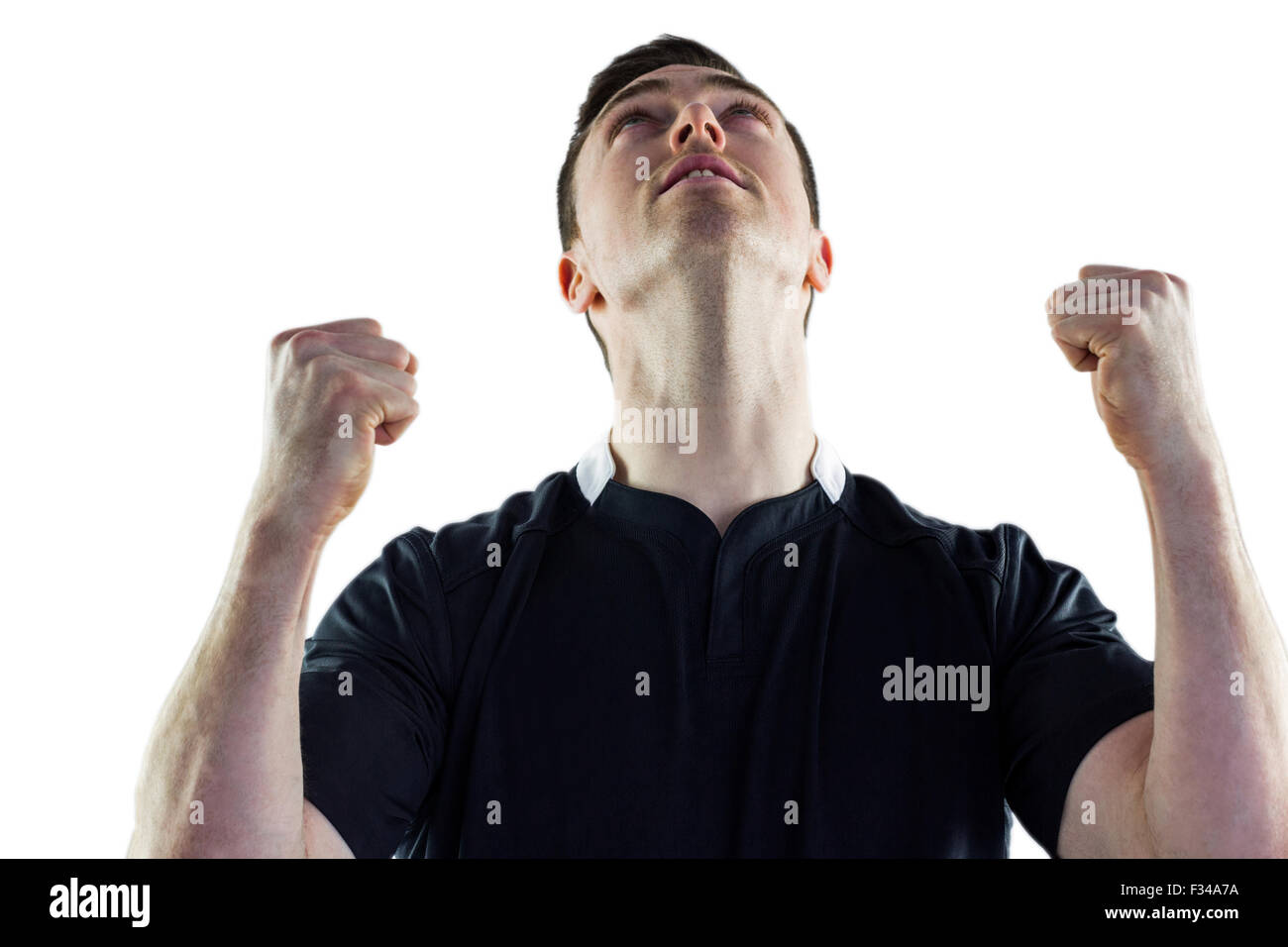 Excited rugby player gesturing victory Stock Photo - Alamy
