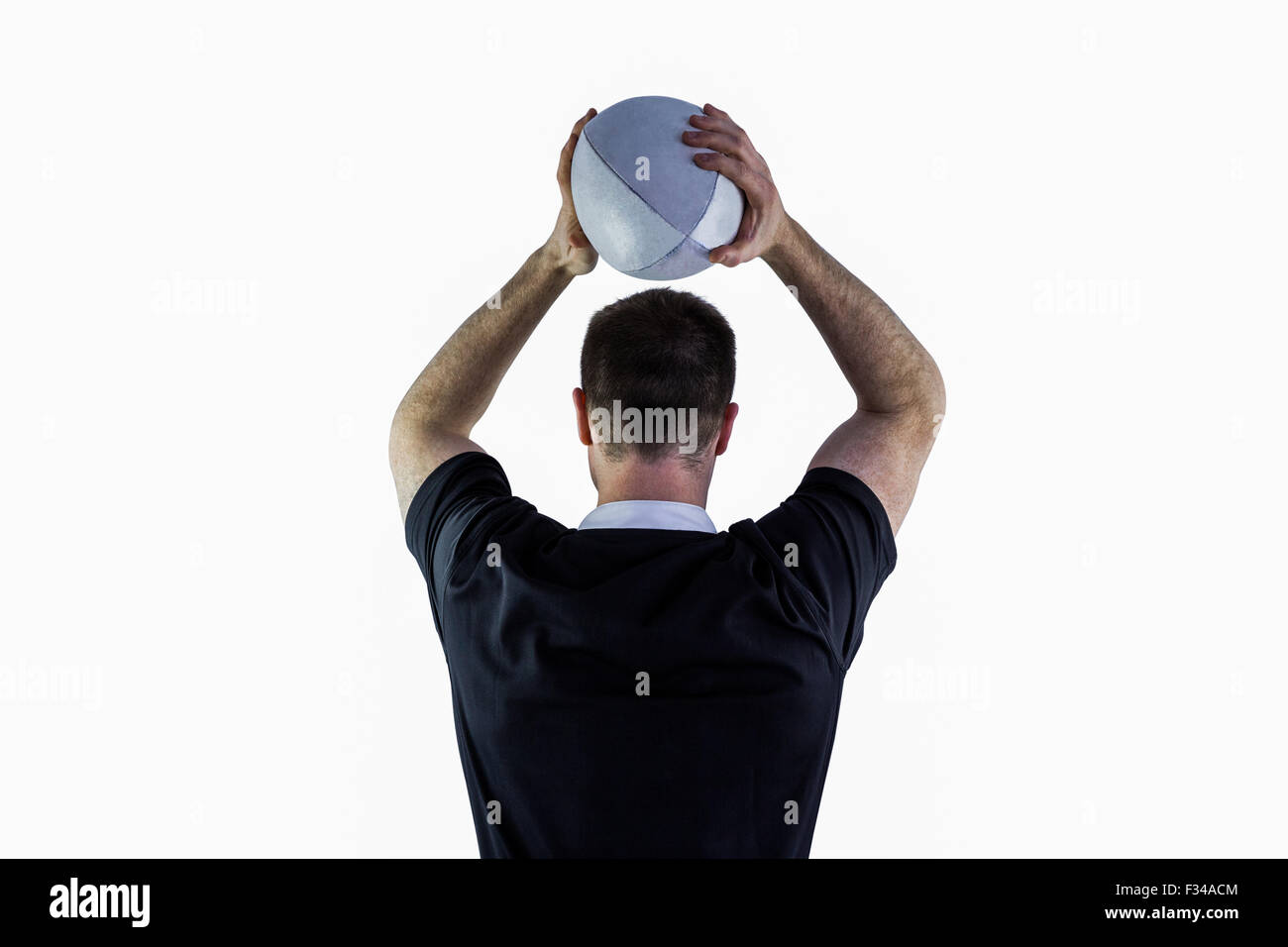 Rugby player about to throw a rugby ball Stock Photo - Alamy