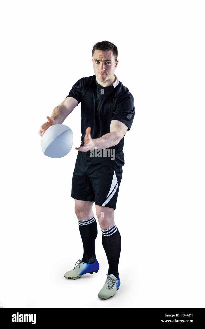 Rugby player throwing a rugby ball Stock Photo - Alamy