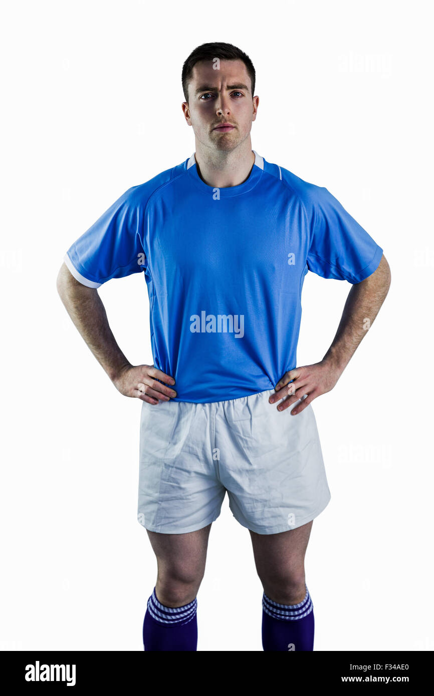 Rugby player with hands on hips Stock Photo - Alamy
