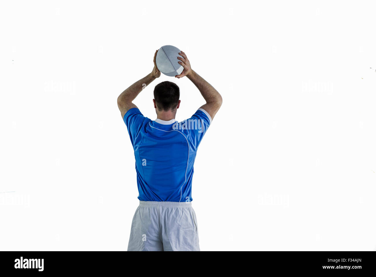 Rugby player about to throw a rugby ball Stock Photo - Alamy