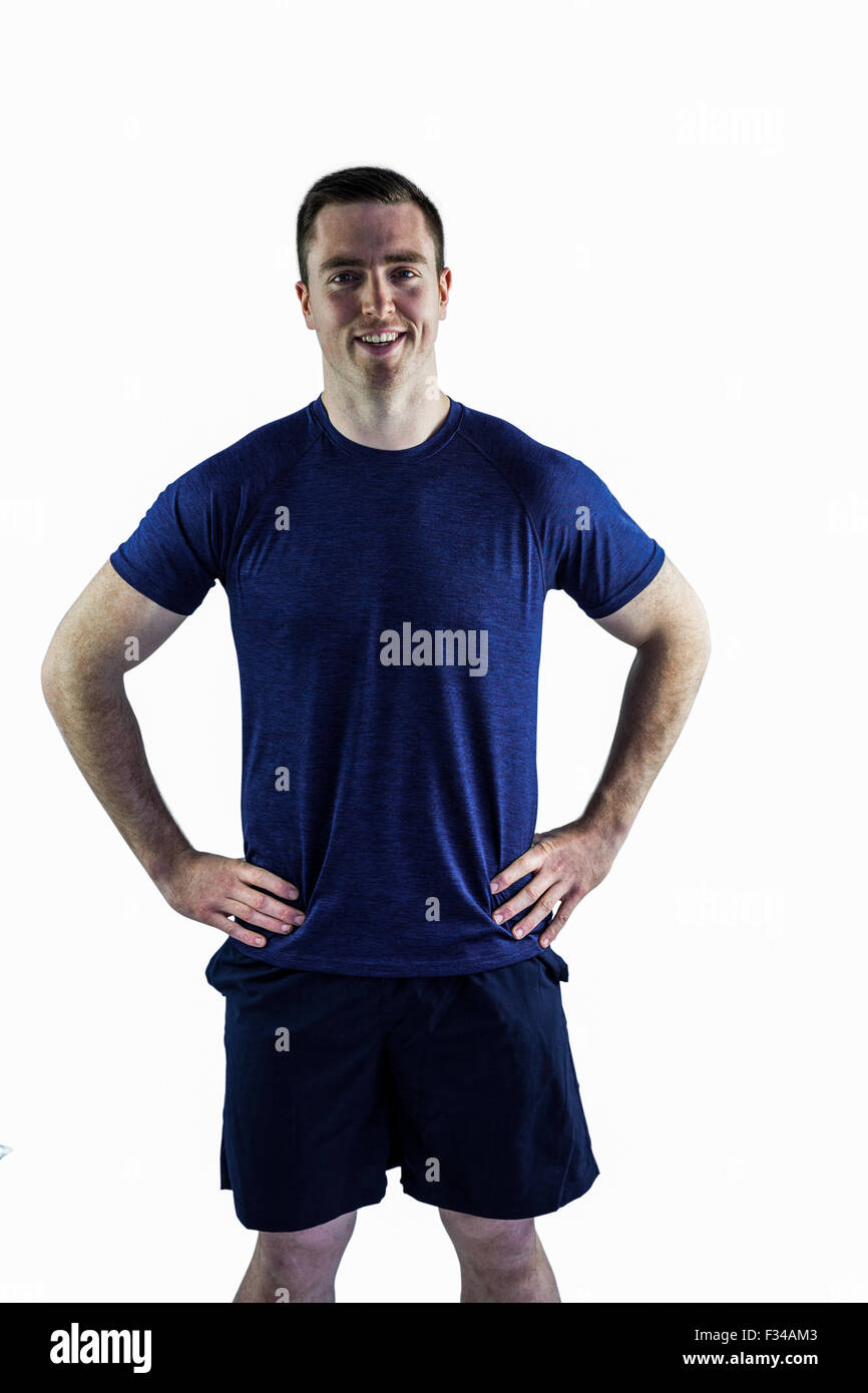 Smiling trainer looking at the camera Stock Photo - Alamy