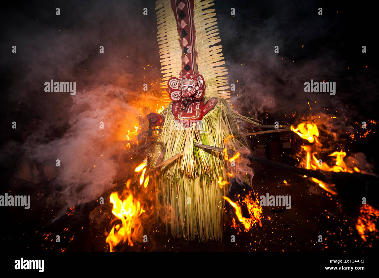 Theyyam with fire hi-res stock photography and images - Alamy