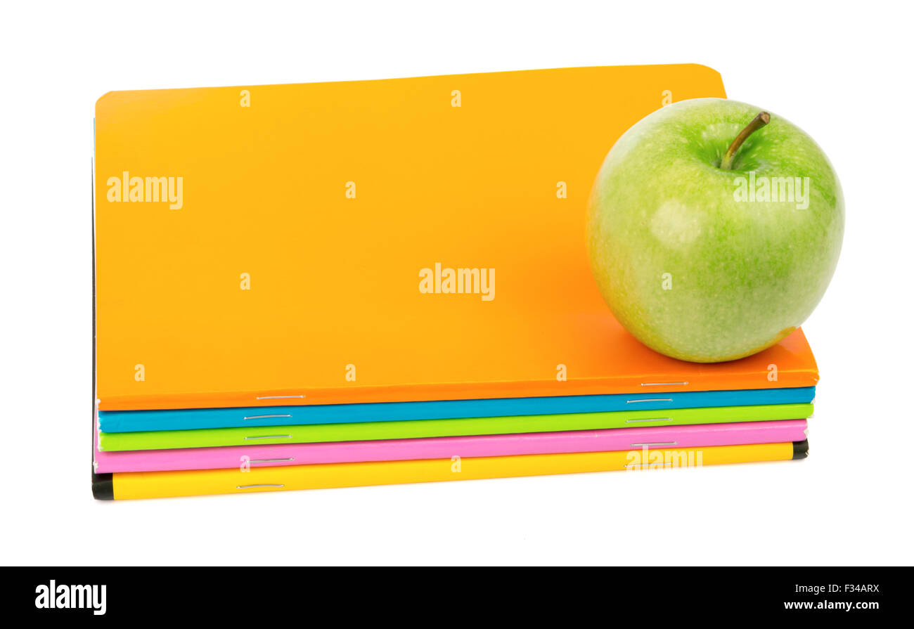 Fresh apple with exercise books Stock Photo - Alamy