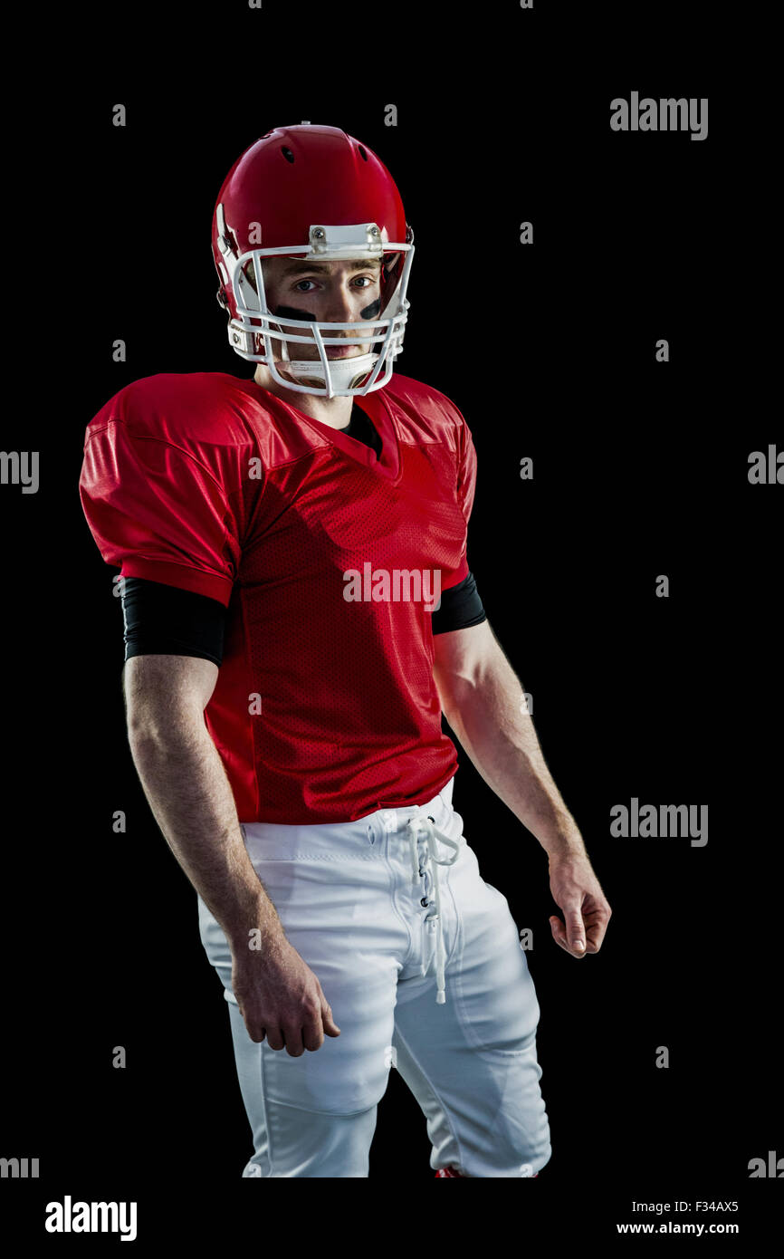 Portrait of american football player wearing his helmet Stock Photo - Alamy