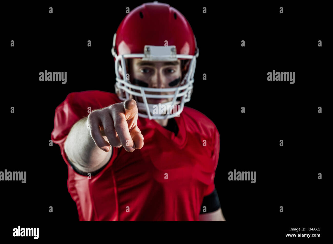 Portrait of american football player pointing to camera Stock Photo - Alamy
