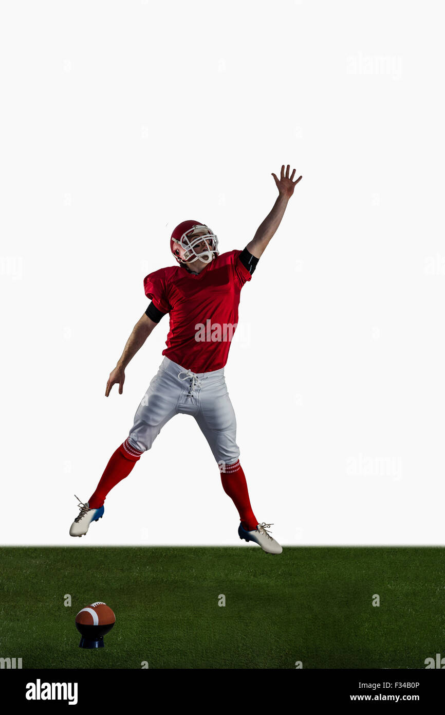 American football player trying to catch football Stock Photo - Alamy