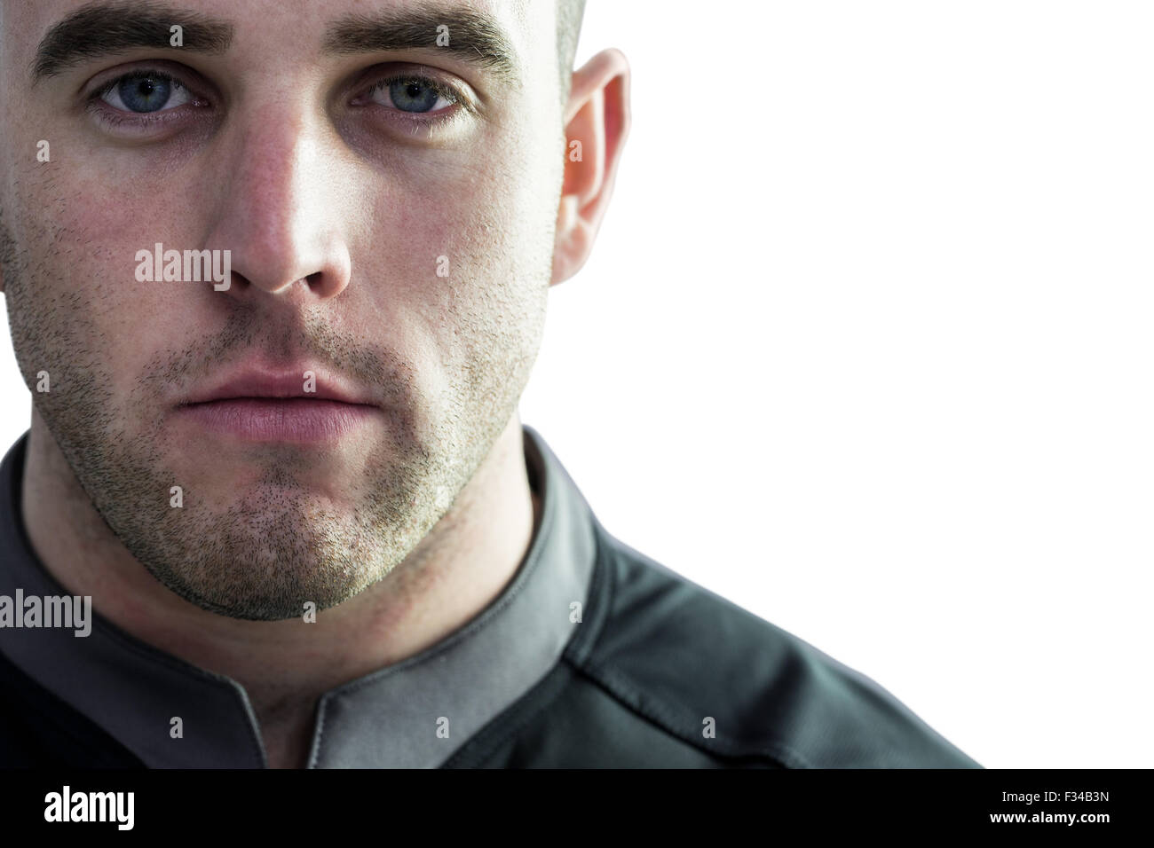 Tough rugby player looking at camera Stock Photo - Alamy