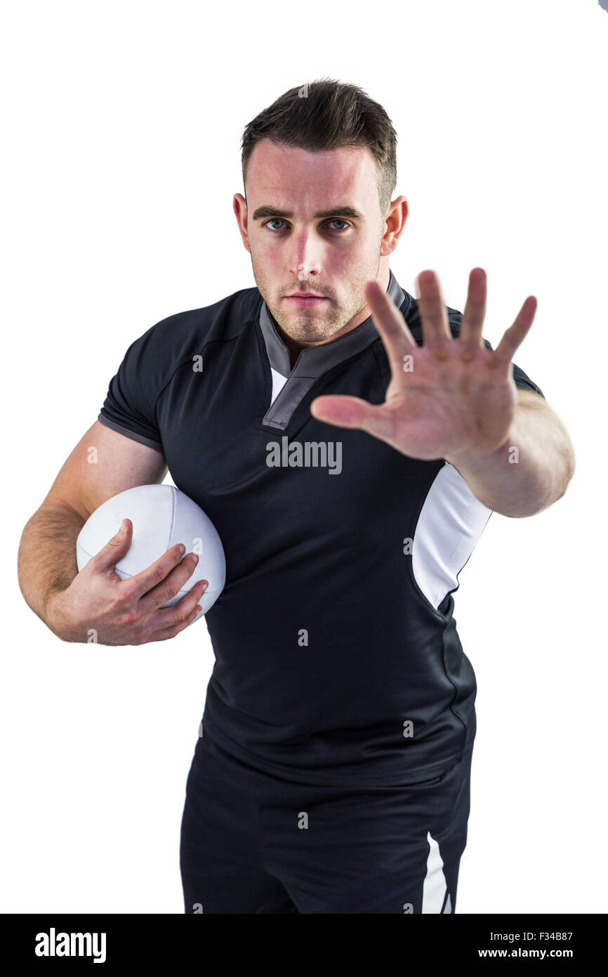 Tough rugby player looking at camera Stock Photo - Alamy