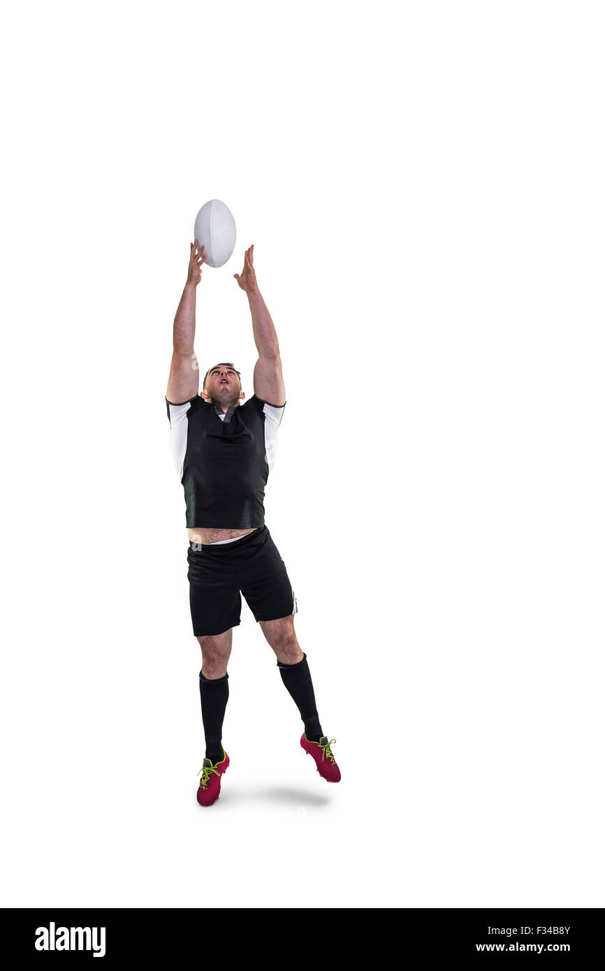 Rugby player catching the ball Stock Photo - Alamy