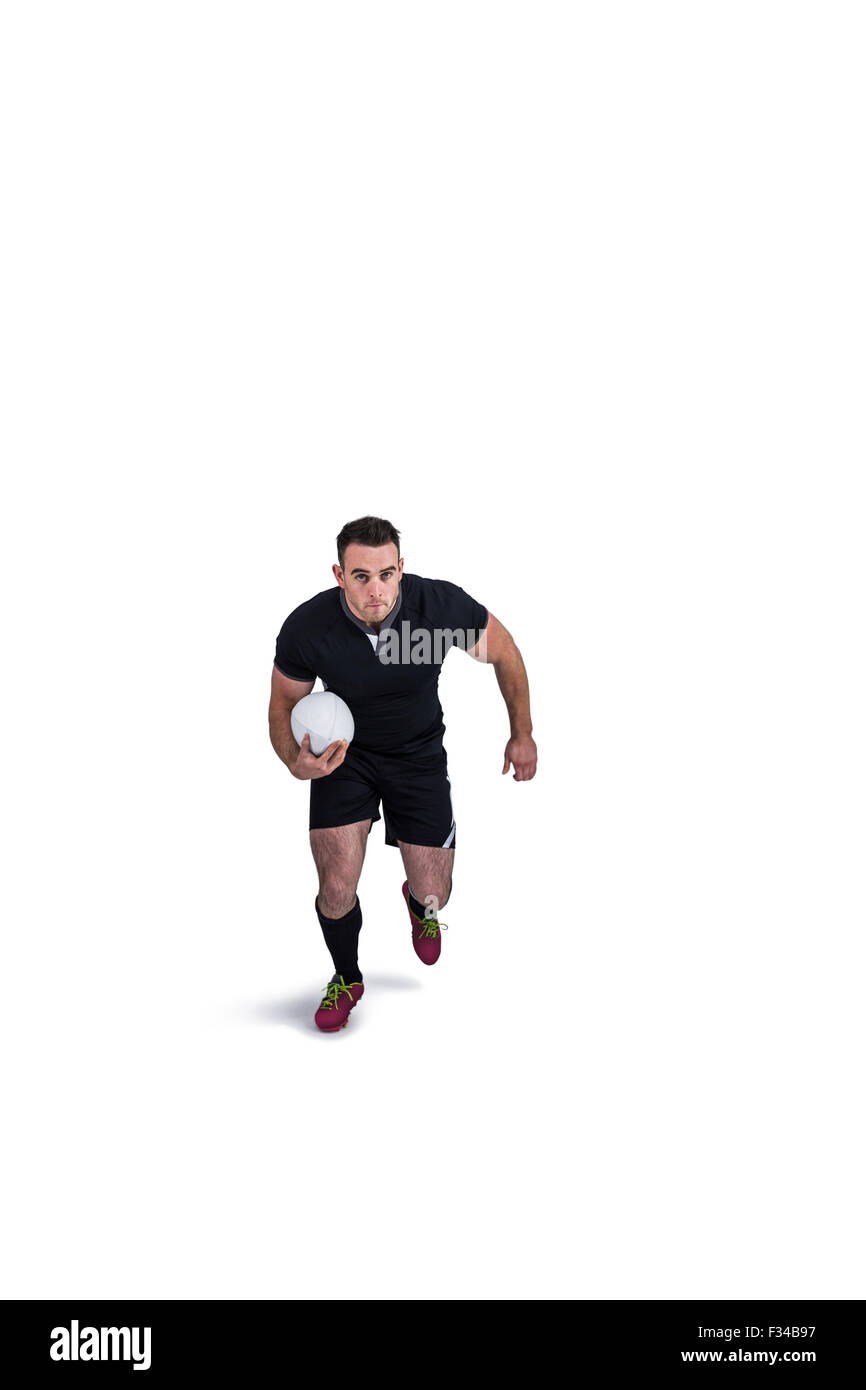 Rugby player running with the ball Stock Photo - Alamy