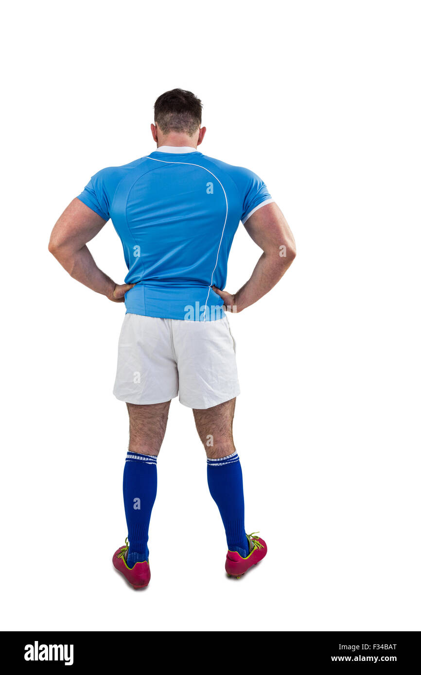 Rugby player with hands on hips Stock Photo - Alamy
