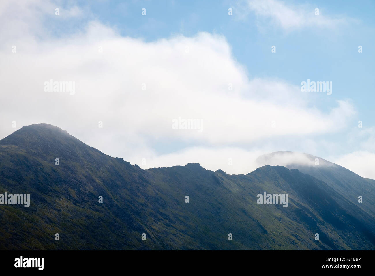 Beenkeragh ridge with low cloud on highest mountain, Carrauntoohil, in ...