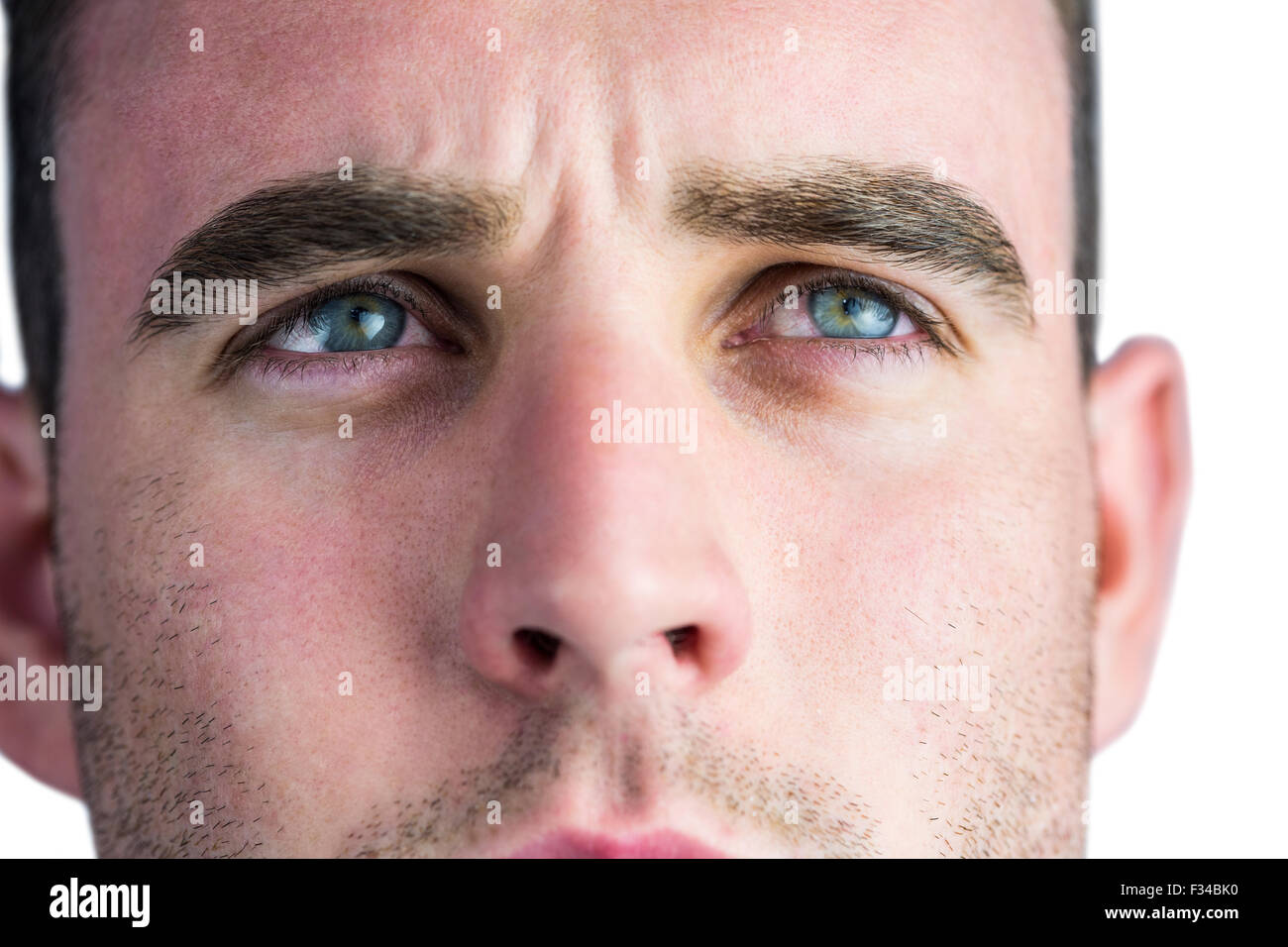 Tough rugby player looking away Stock Photo - Alamy