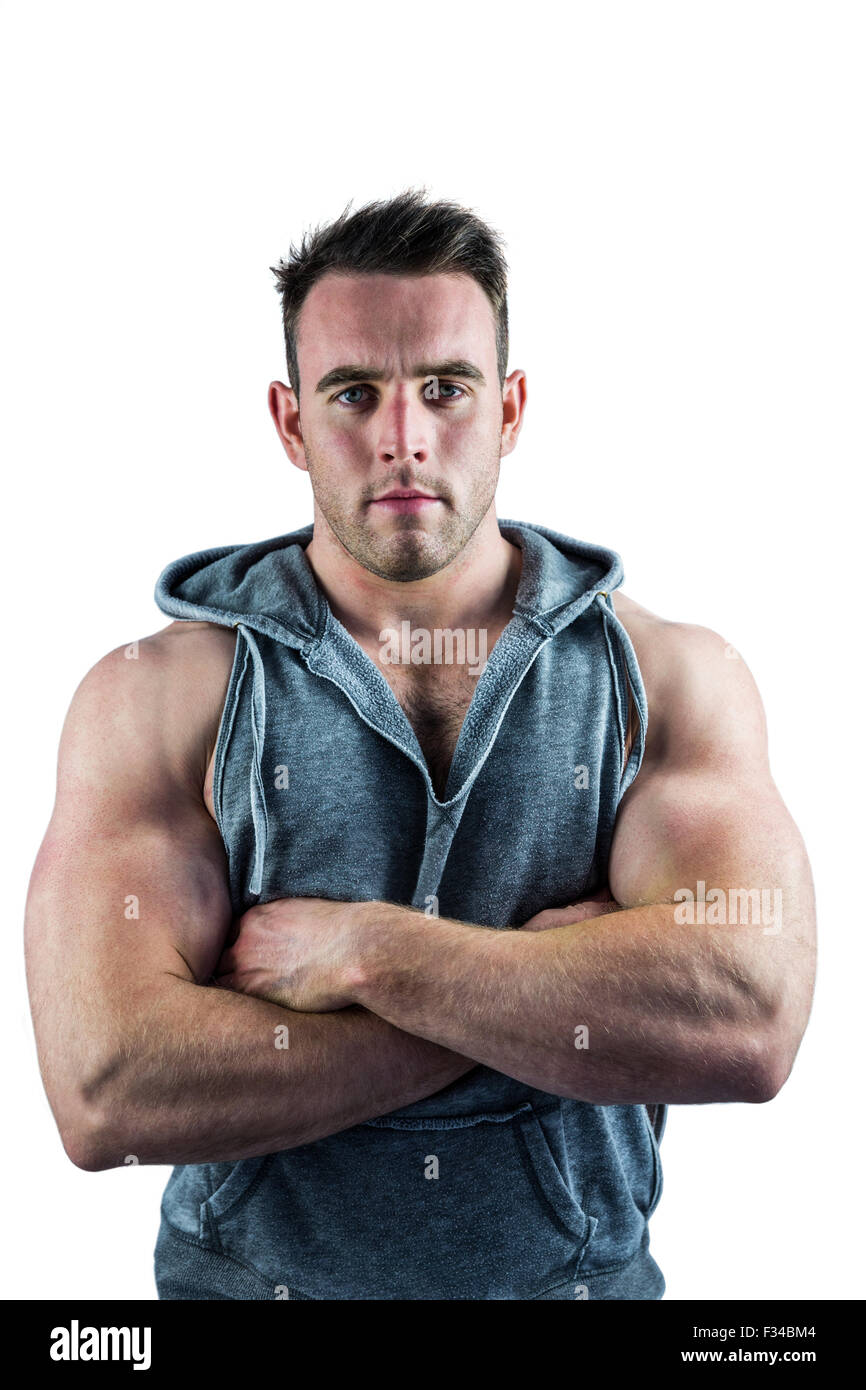 Handsome bodybuilder with arms crossed Stock Photo - Alamy