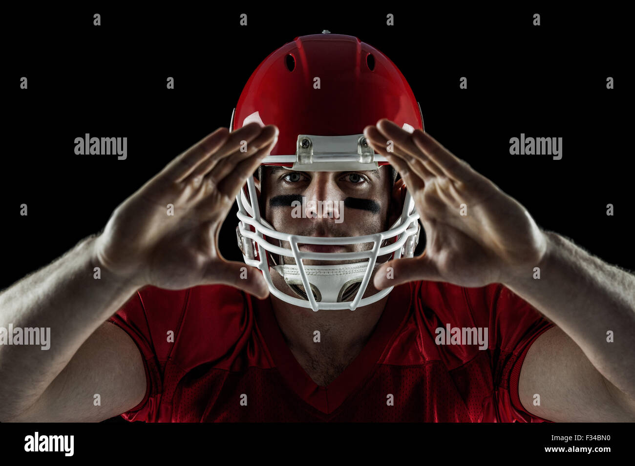 American football player making hand gesture Stock Photo - Alamy