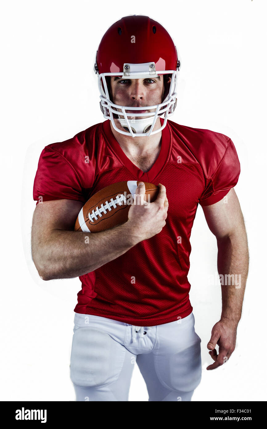 American football player with ball Stock Photo - Alamy