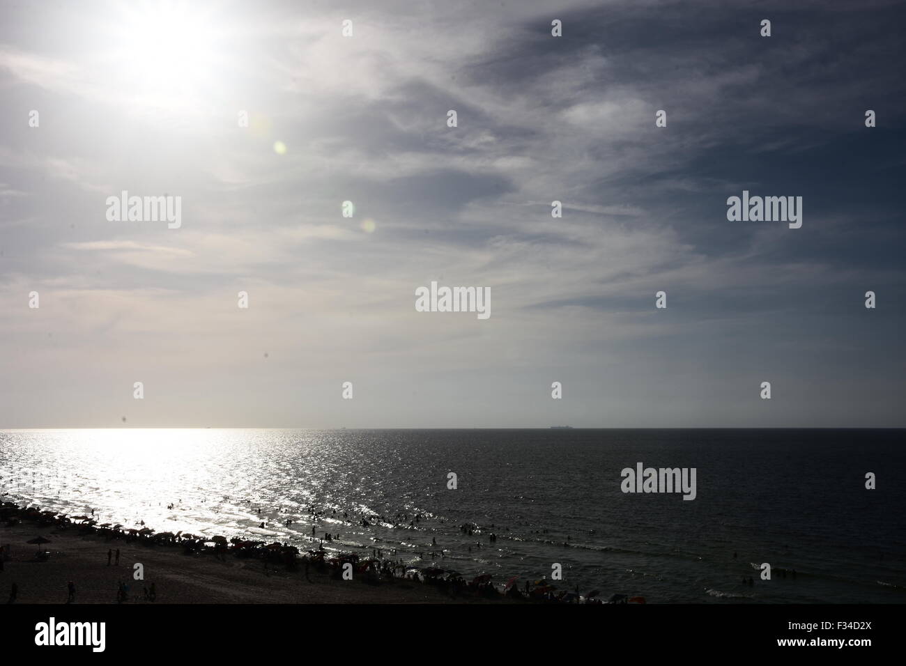 Sunlight on the beach Stock Photo - Alamy