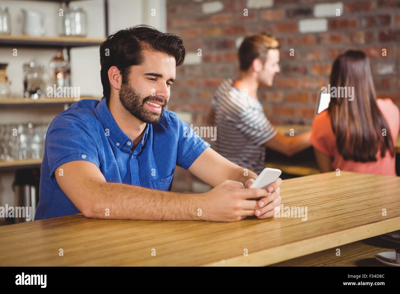 Indian man showing phone hi-res stock photography and images - Alamy