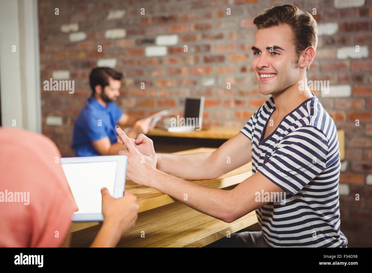 Waitress taking order with a tablet Stock Photo - Alamy