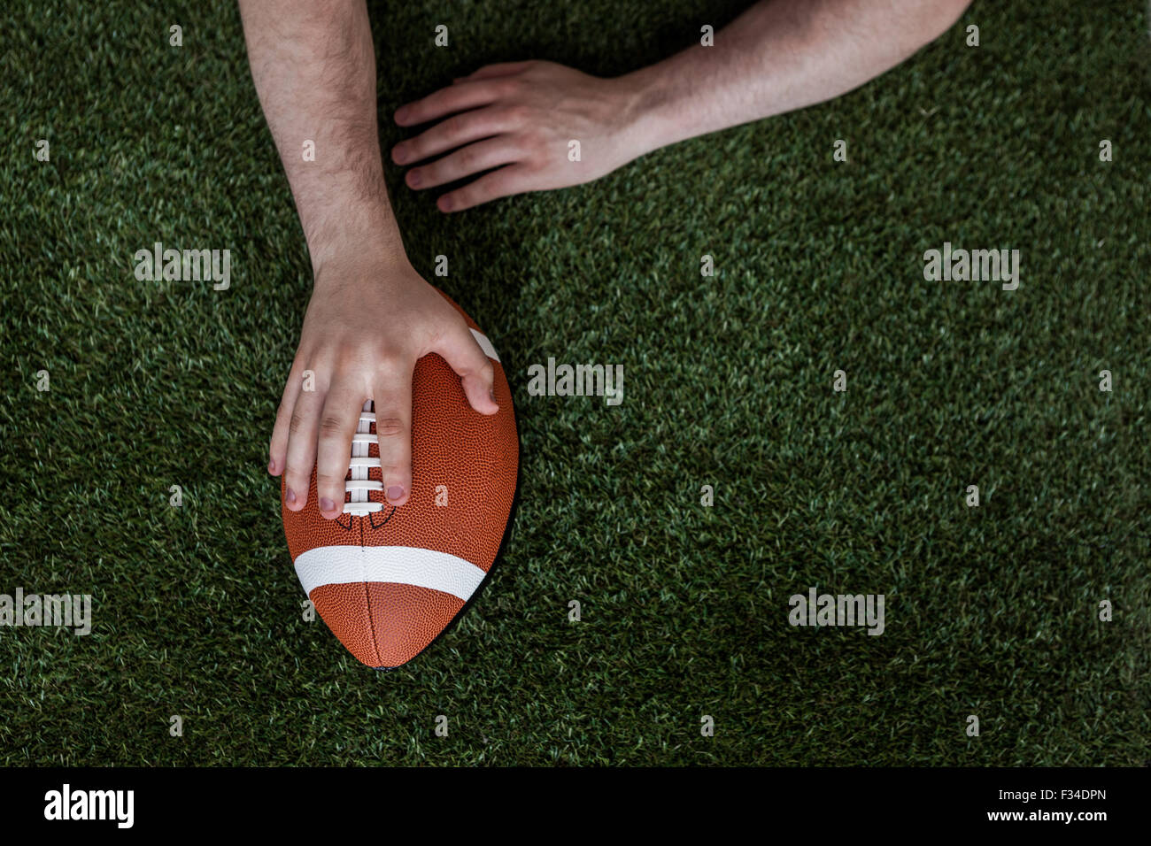 American football player scoring a touchdown Stock Photo - Alamy