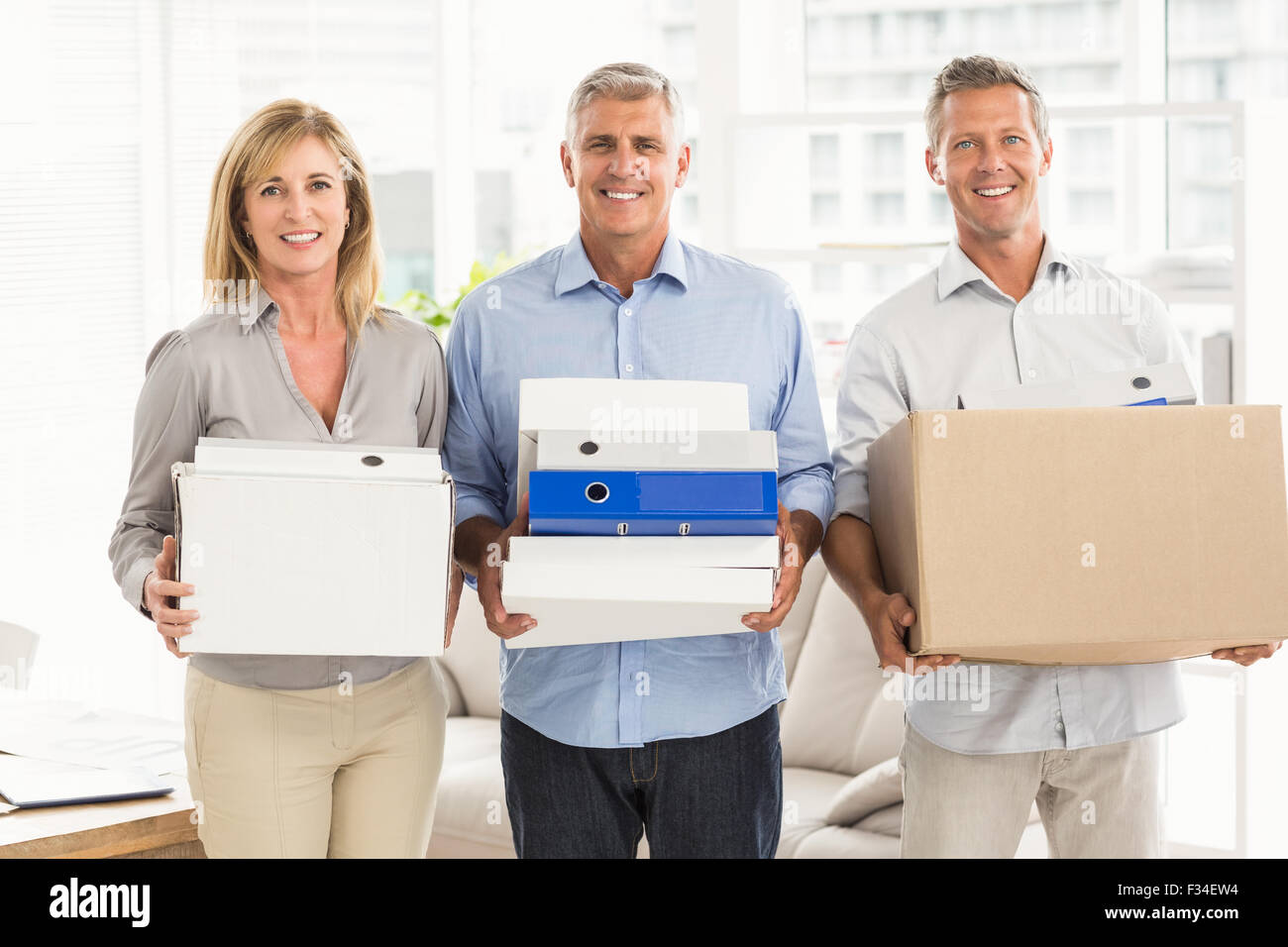 Well dressed woman carrying folder hi-res stock photography and images ...