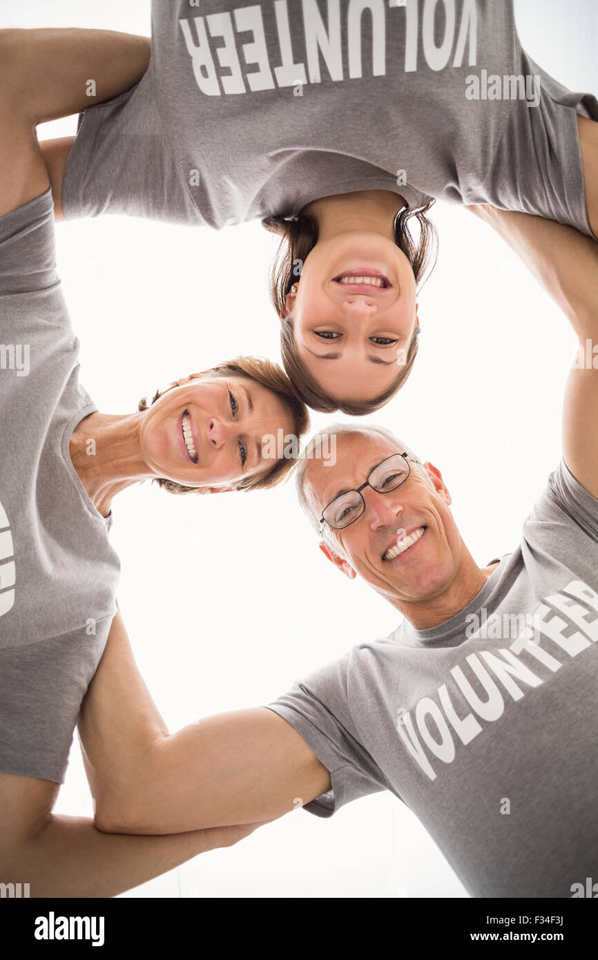Group volunteers looking camera hi-res stock photography and images - Alamy