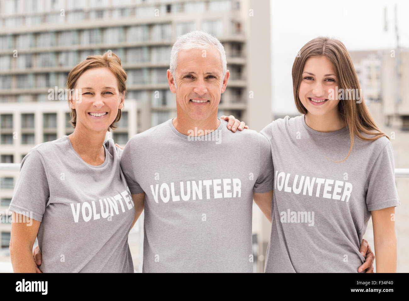 Putting arms around hi-res stock photography and images - Alamy