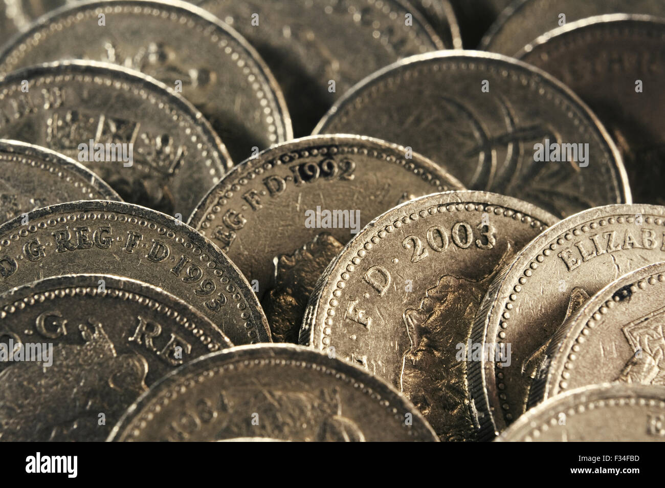 A pile of British one pound coins Stock Photo - Alamy