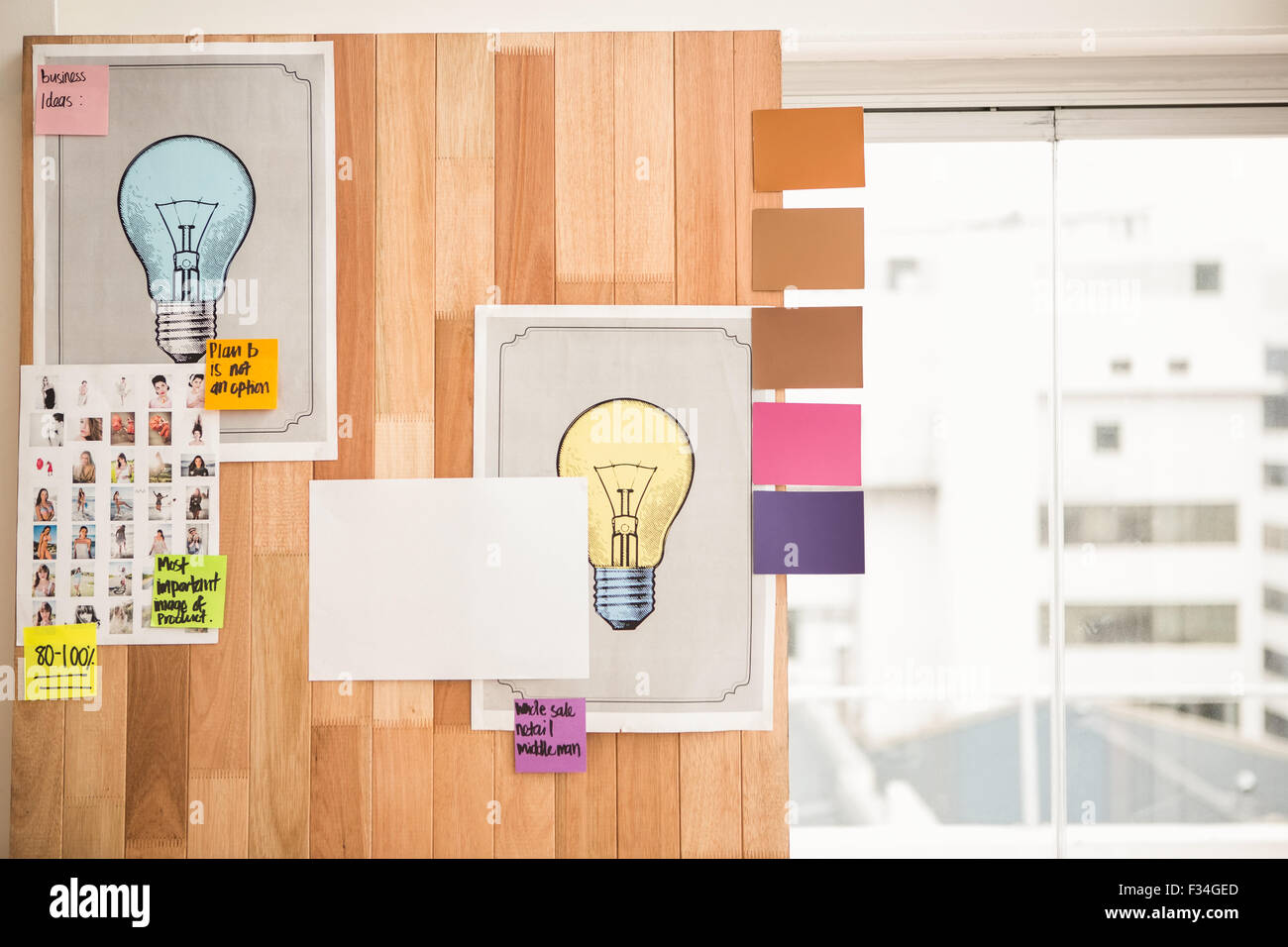 Illustrations and sticky notes on wooden wall Stock Photo - Alamy