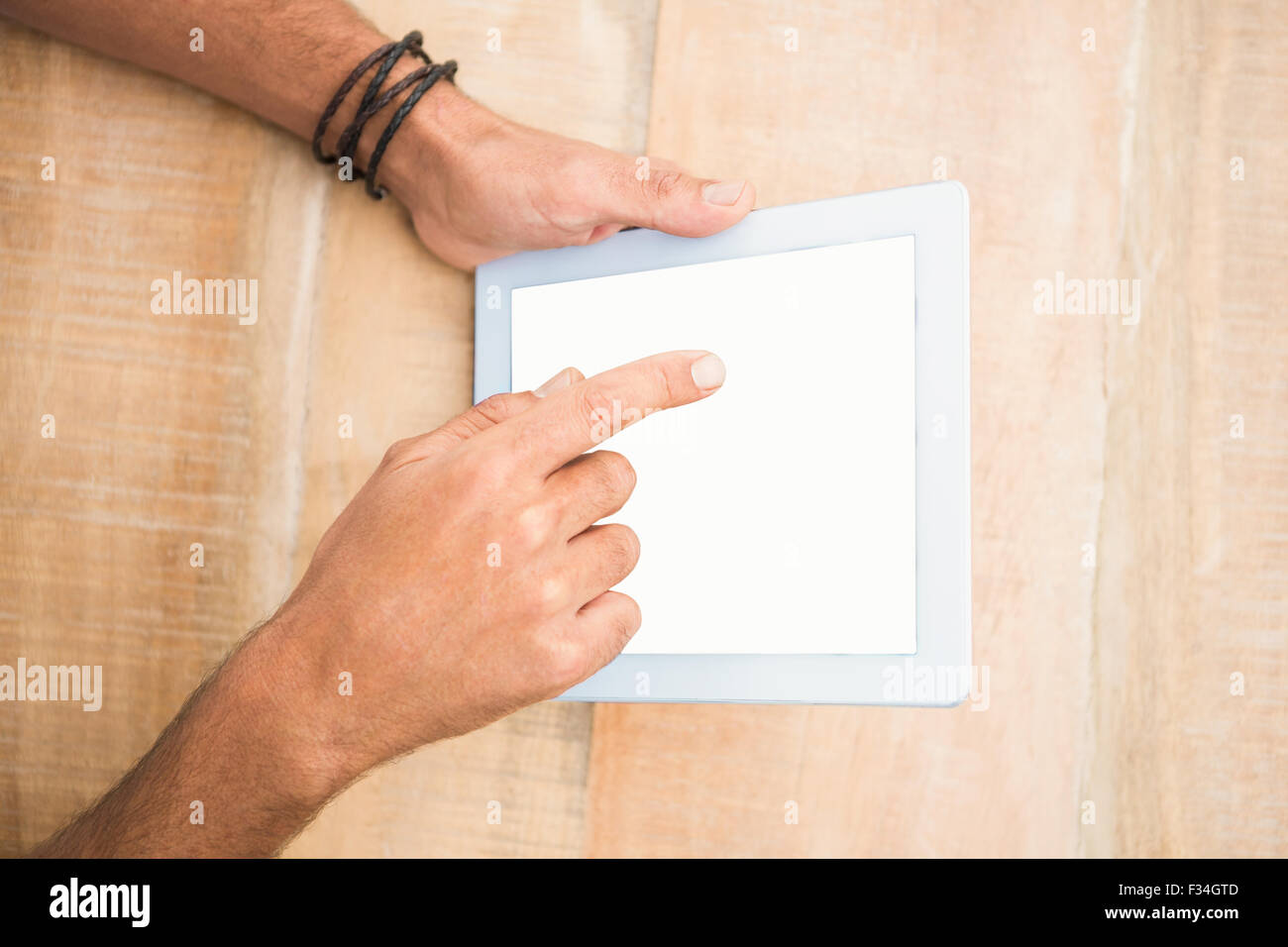 Hand pointing blank screen tablet Stock Photo - Alamy