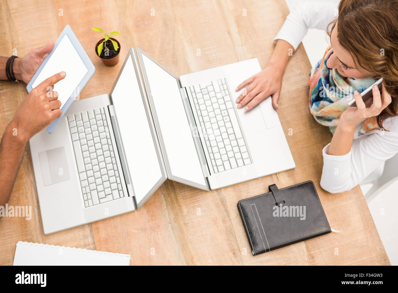 Casual businesswoman working and having phone call Stock Photo - Alamy