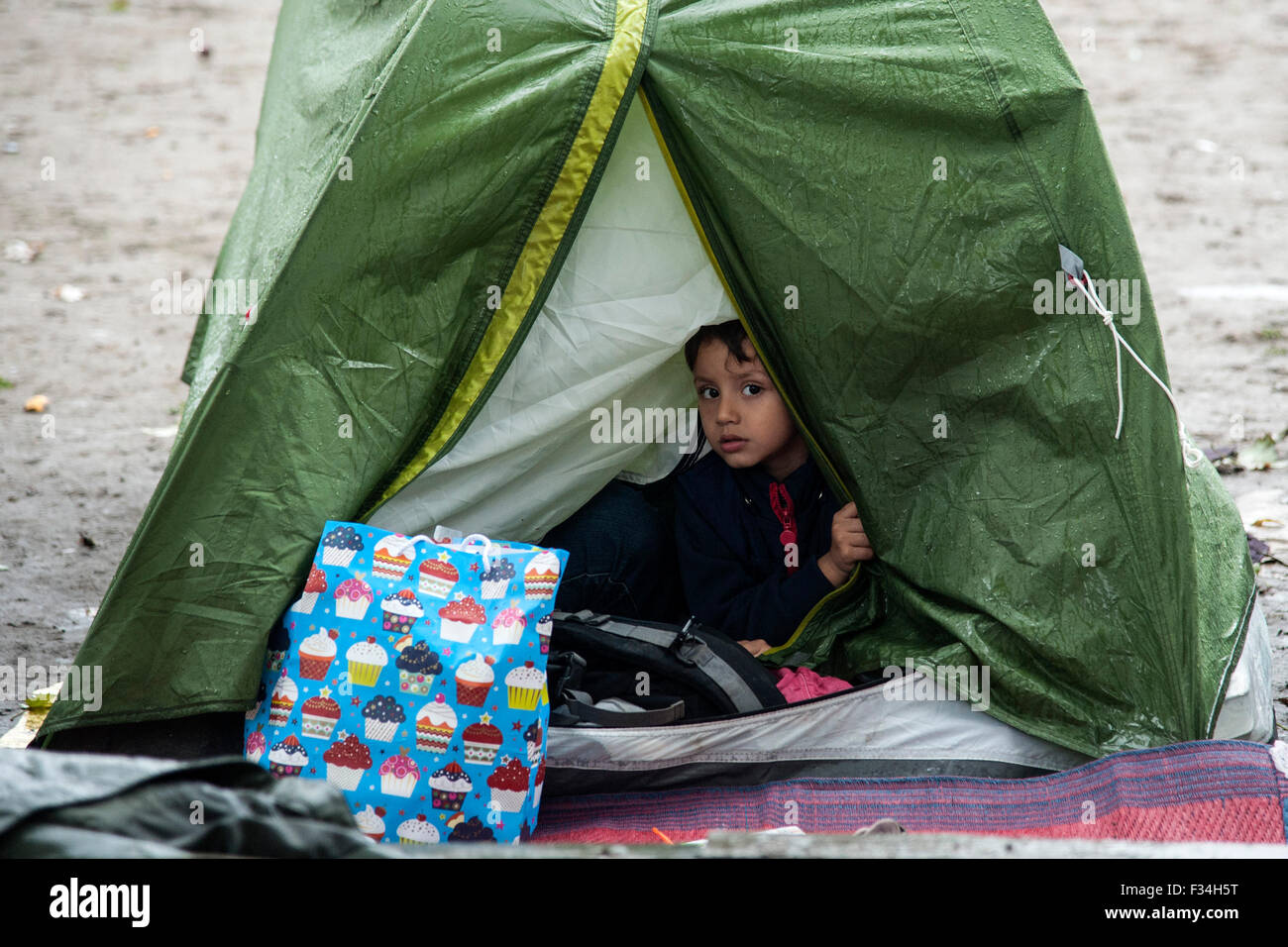 Refugee woman inside tent in hi-res stock photography and images - Alamy