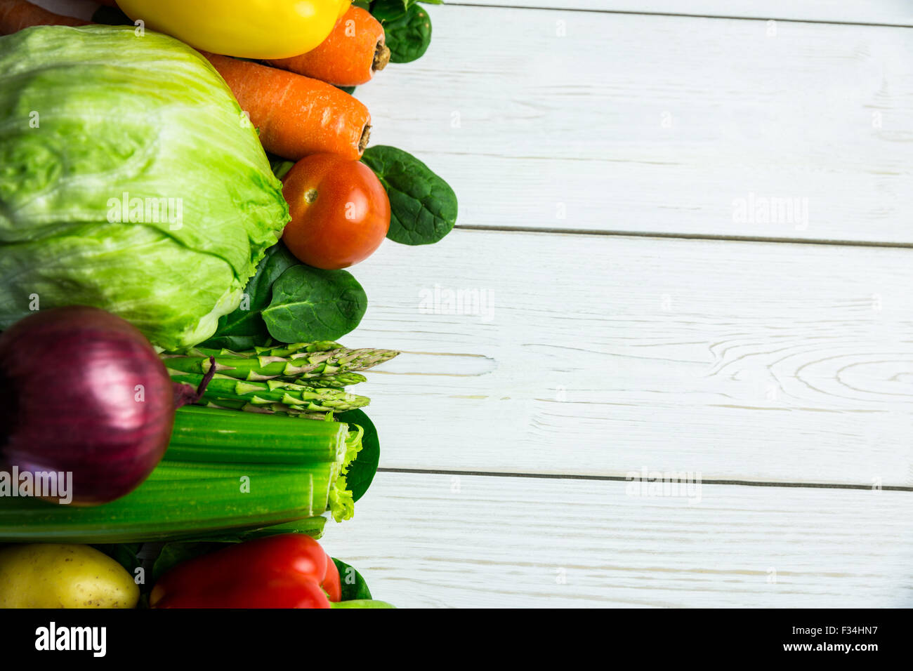 Line of vegetables on table Stock Photo - Alamy