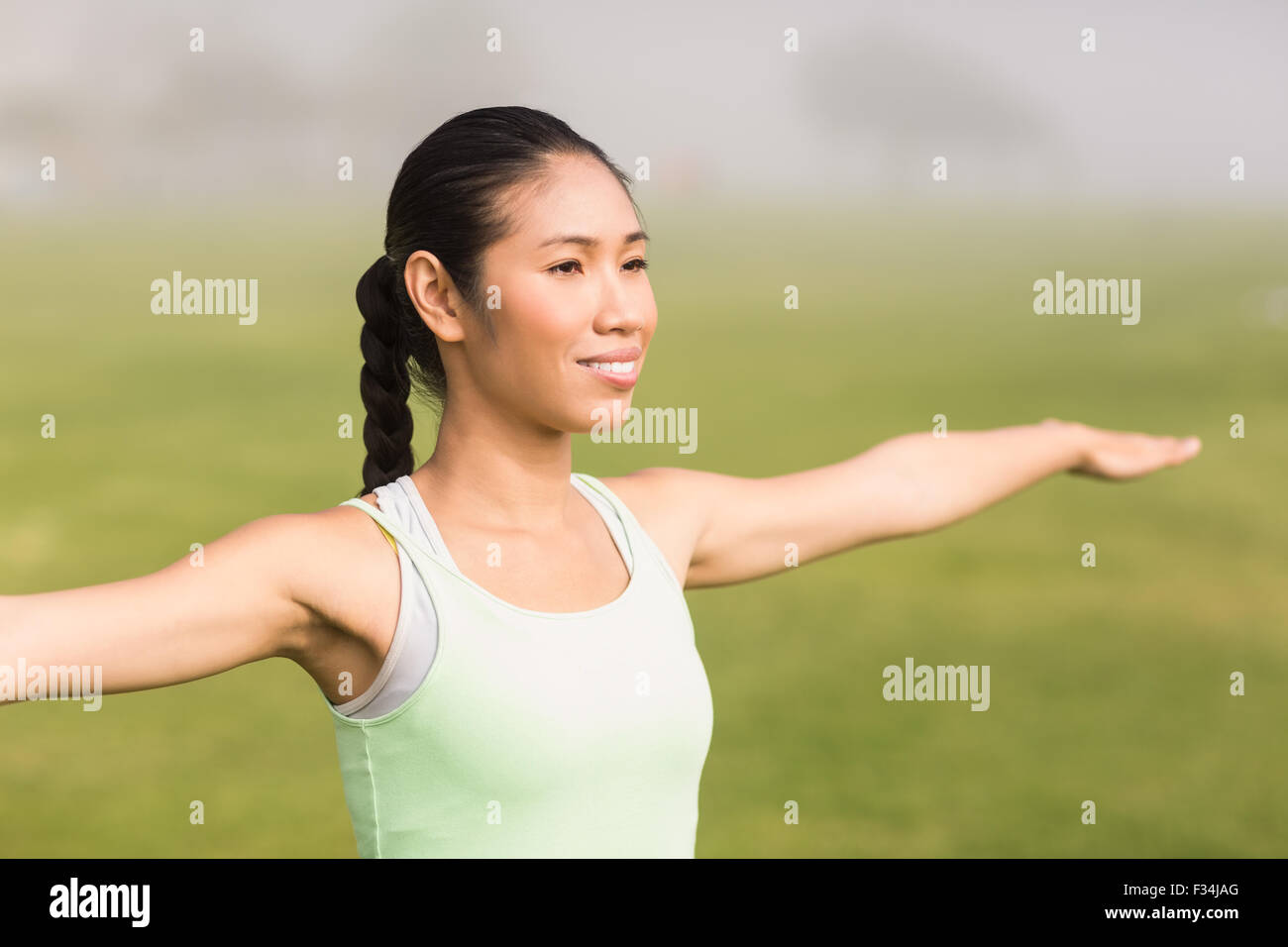 Smiling sporty woman working out Stock Photo - Alamy