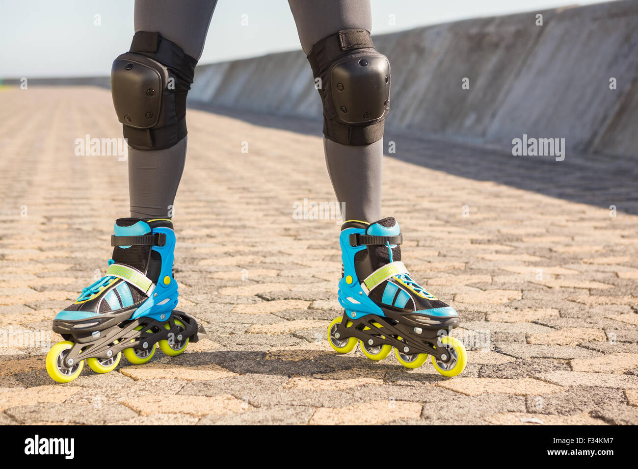 Close up view of woman wearing inline skates Stock Photo - Alamy