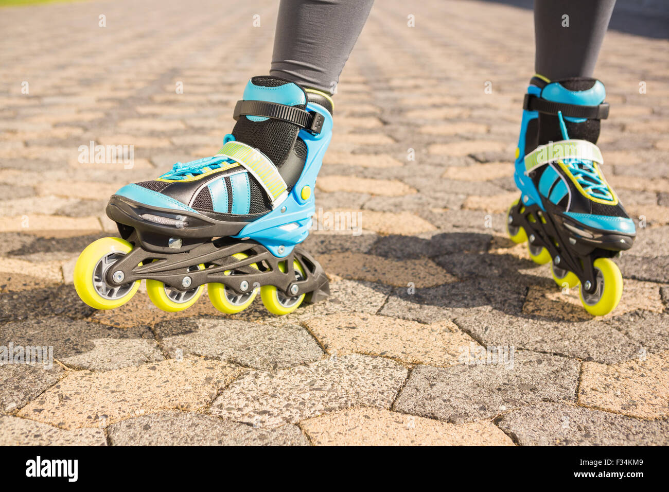 Close up view of woman wearing inline skates Stock Photo - Alamy