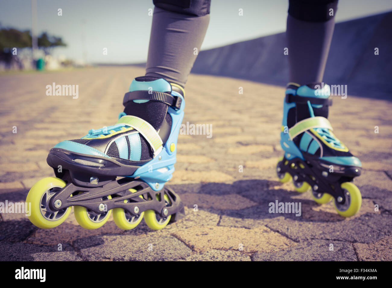 Close up view of woman wearing inline skates Stock Photo - Alamy