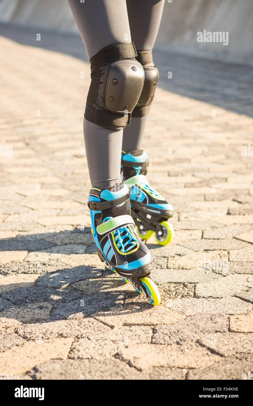 Close up view of woman wearing inline skates Stock Photo - Alamy