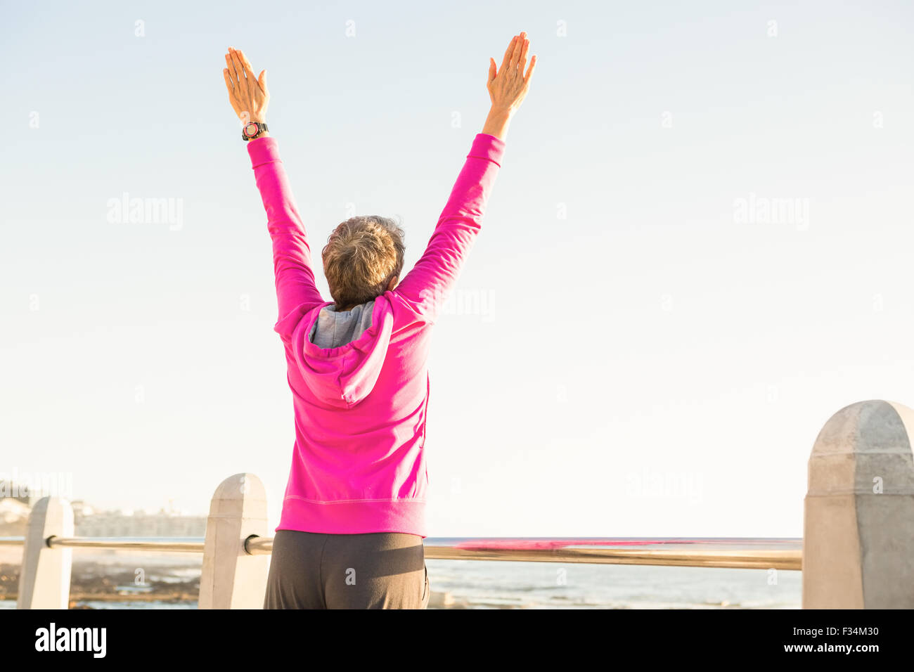 Woman outstretched arms hi-res stock photography and images - Alamy