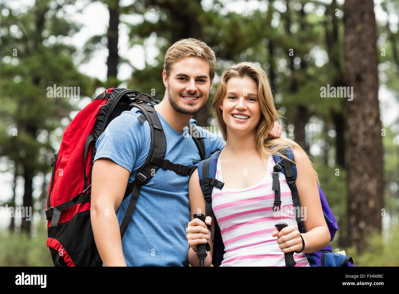 Portrait of a smiling hiker couple Stock Photo - Alamy
