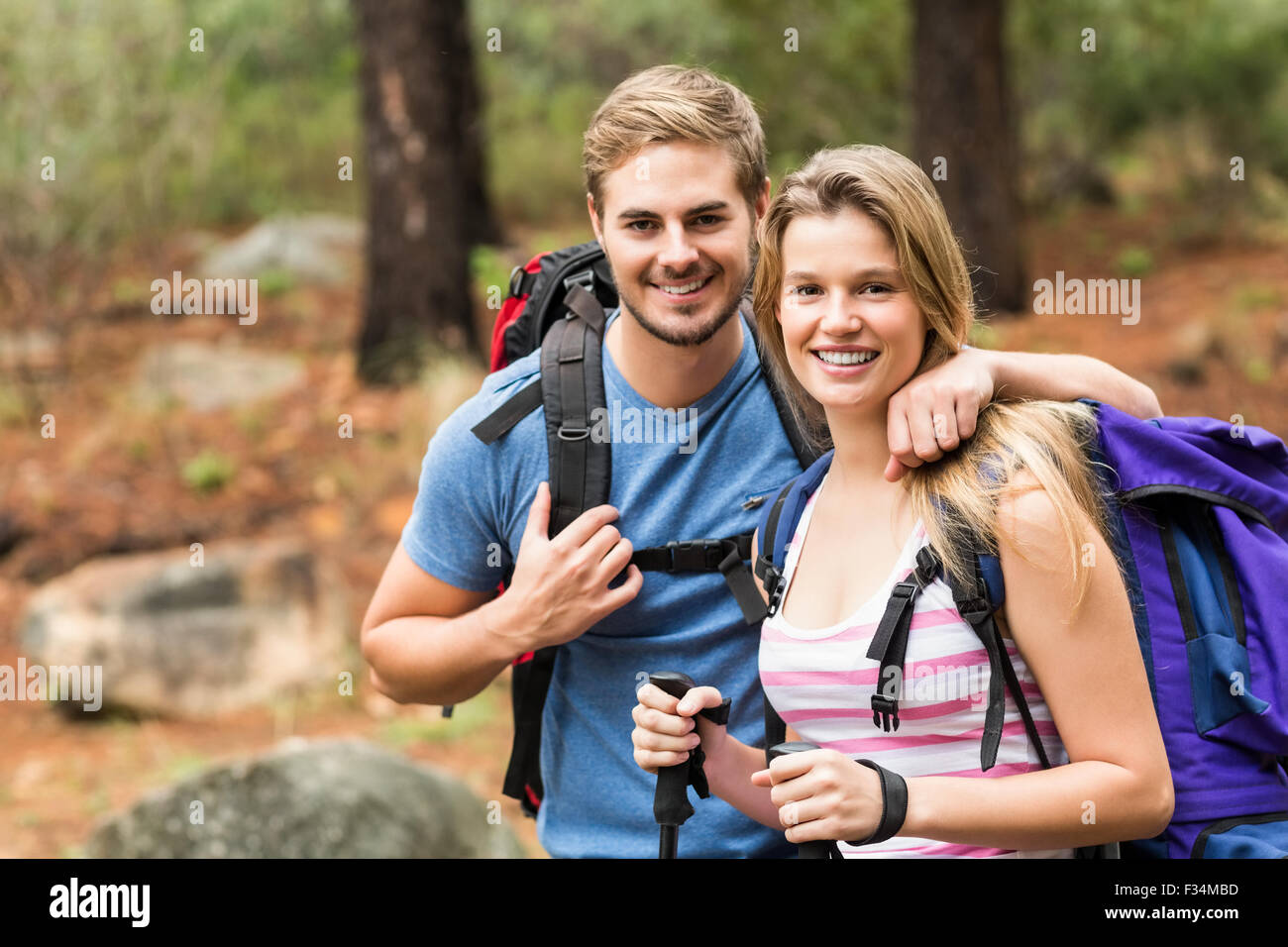 Portrait of a smiling hiker couple Stock Photo - Alamy