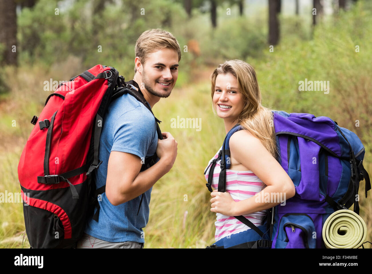 Portrait of a smiling hiker couple Stock Photo - Alamy